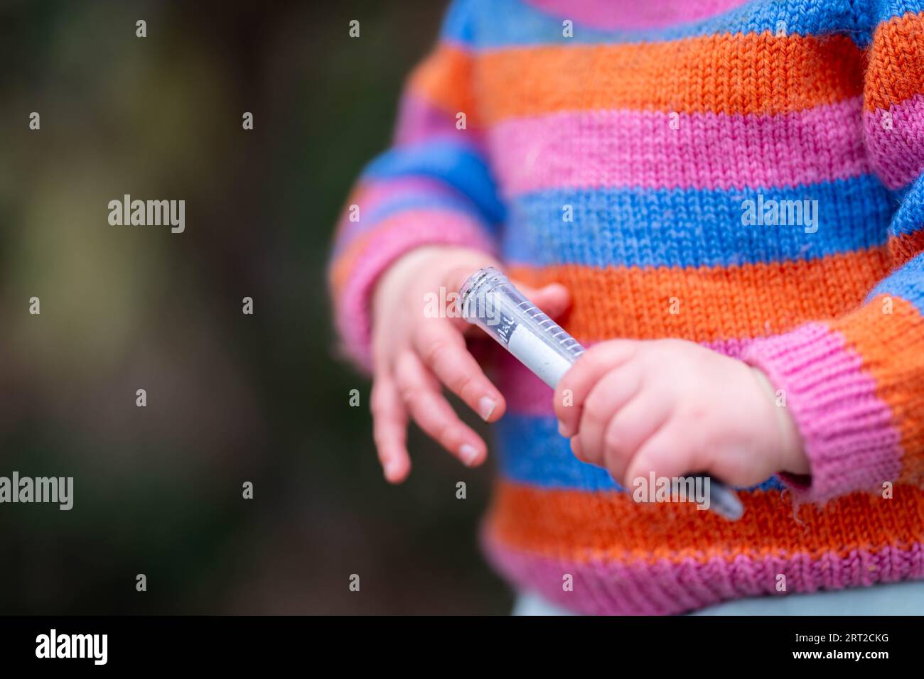 kid with test tube on farm in australia Stock Photo - Alamy