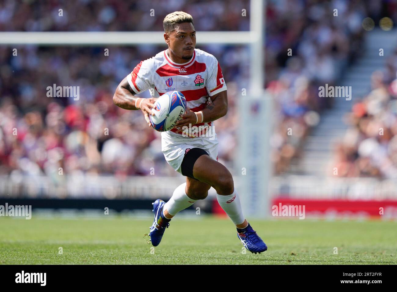 Japan's Lomano Lava Lemeki makes a run during the Rugby World Cup Pool D match between Japan and ...
