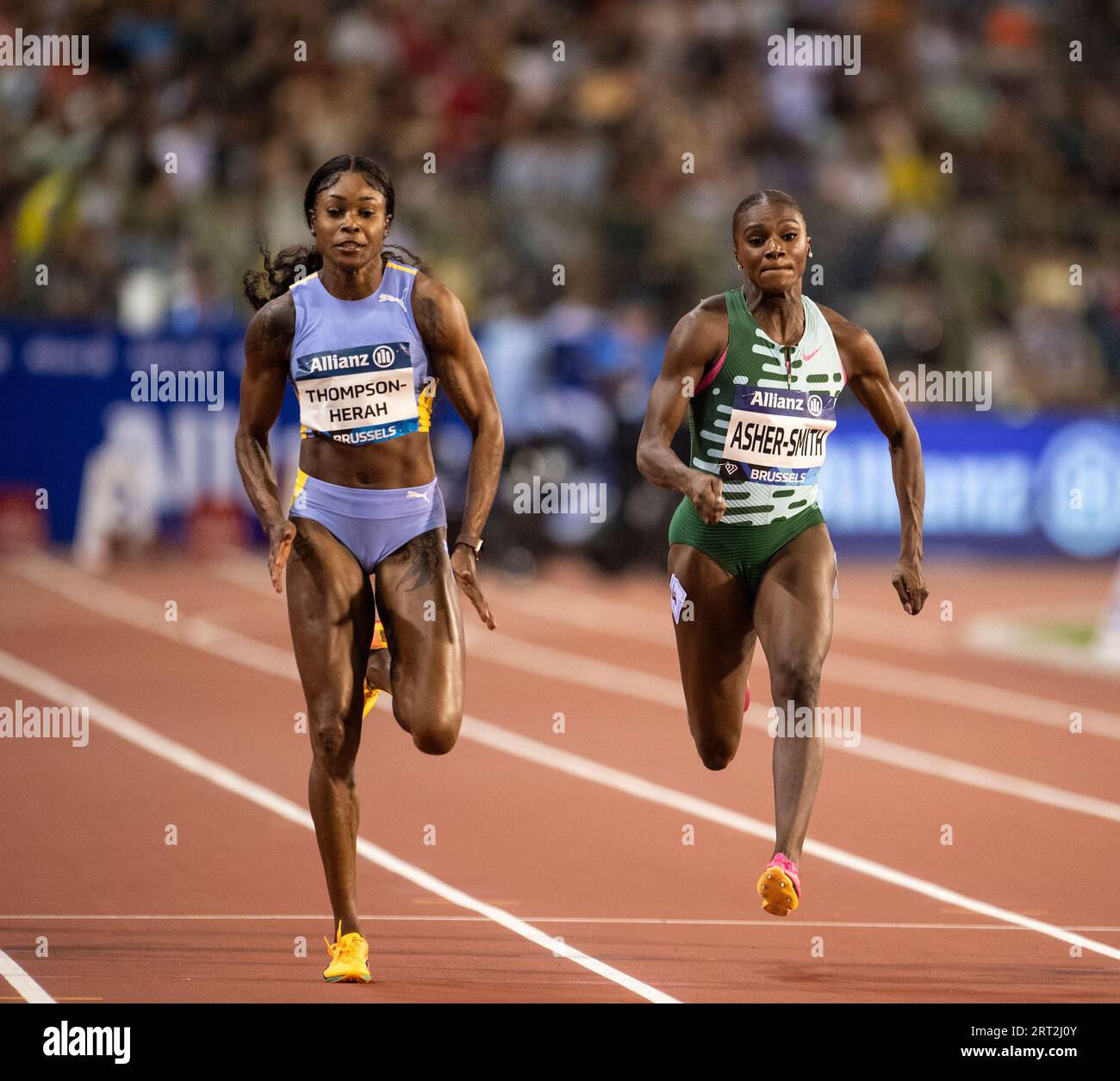 Elaine Thompson-Herah of Jamaica and Dina Asher-Smith of GB & NI competing in the women’s 100m ...