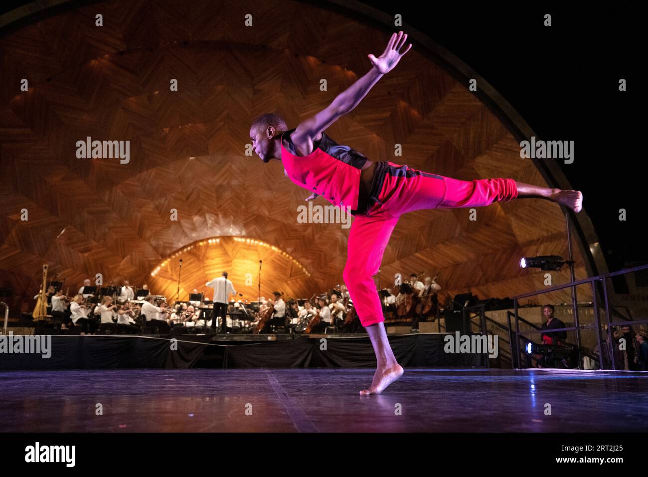 Dancers perform with the Boston Landmarks Orchestra at the Hatch Shell ...