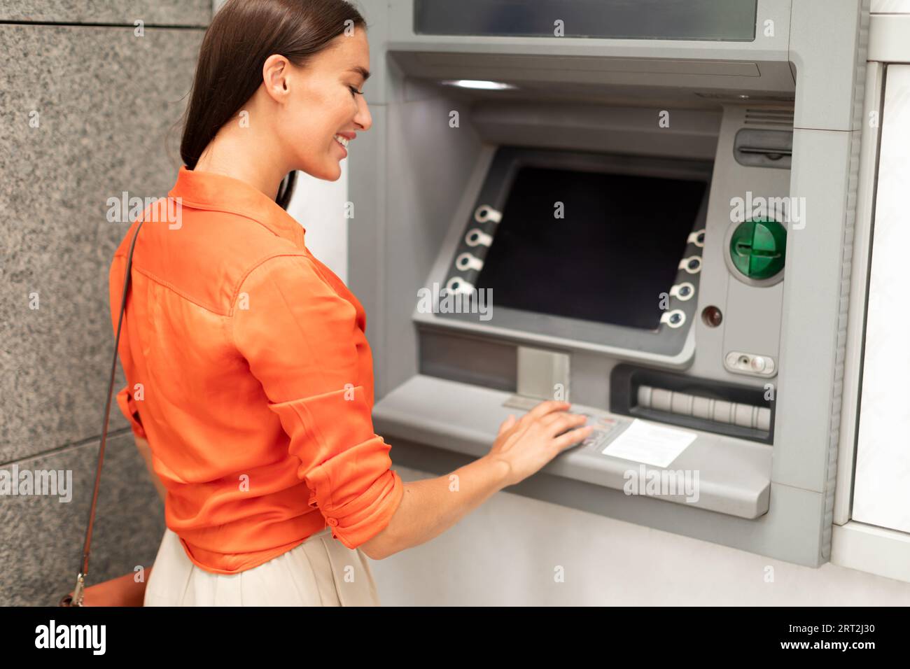 Bank Client Woman Using ATM Machine For Money Withdrawal Outdoor Stock ...