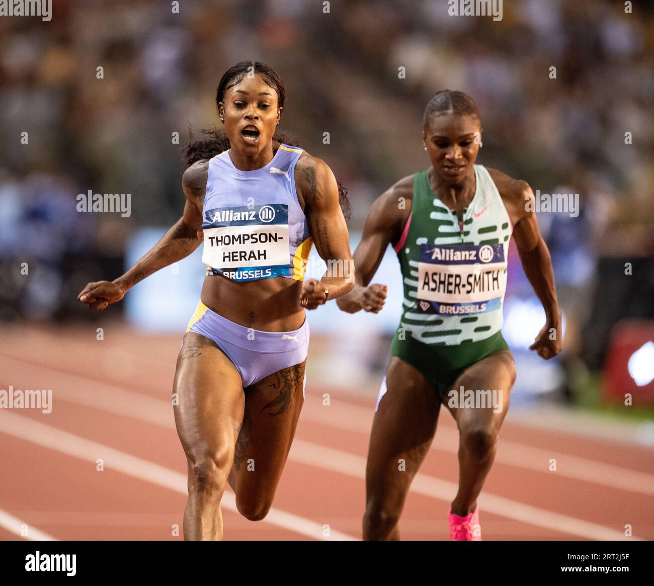 Elaine Thompson-Herah of Jamaica and Dina Asher-Smith of GB & NI competing in the women’s 100m ...