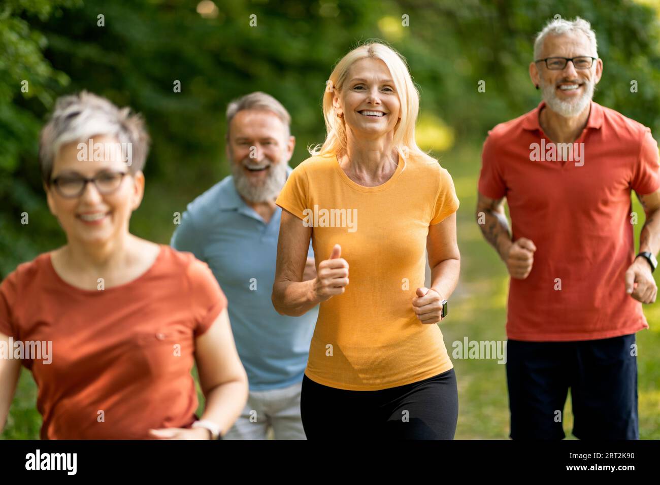 Group people jogging in park hi-res stock photography and images - Alamy