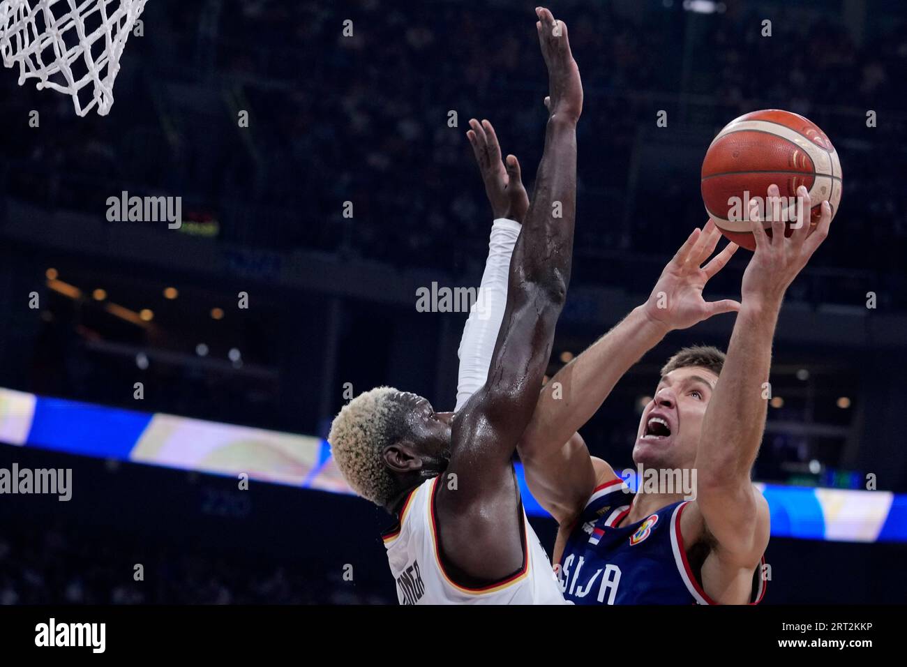 Serbia guard Bogdan Bogdanovic (7) shoots over Germany guard Isaac ...