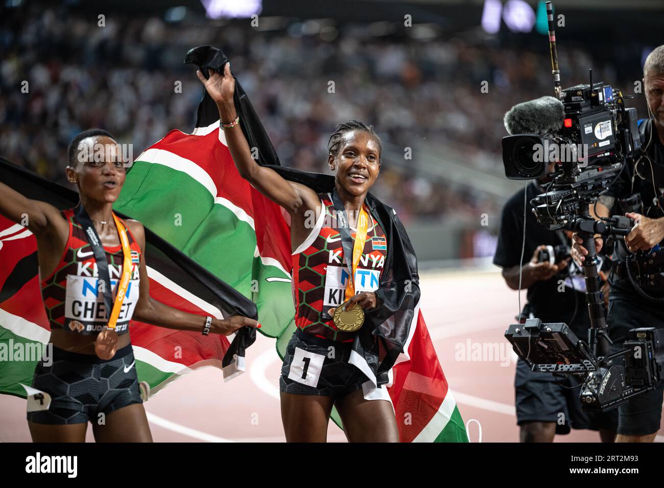 Faith Kipyegon and Beatrice Chebet celebrating hermedal with her ...