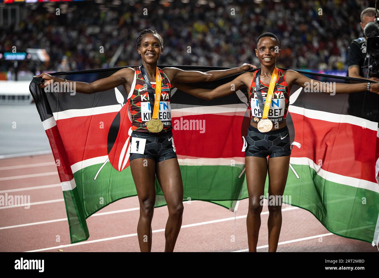 Faith Kipyegon and Beatrice Chebet celebrating hermedal with her ...
