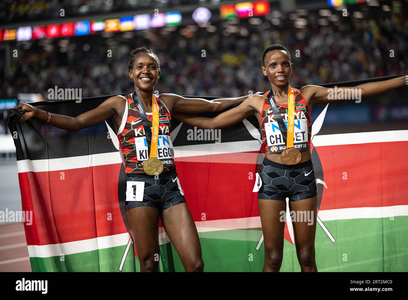 Faith Kipyegon and Beatrice Chebet celebrating hermedal with her ...