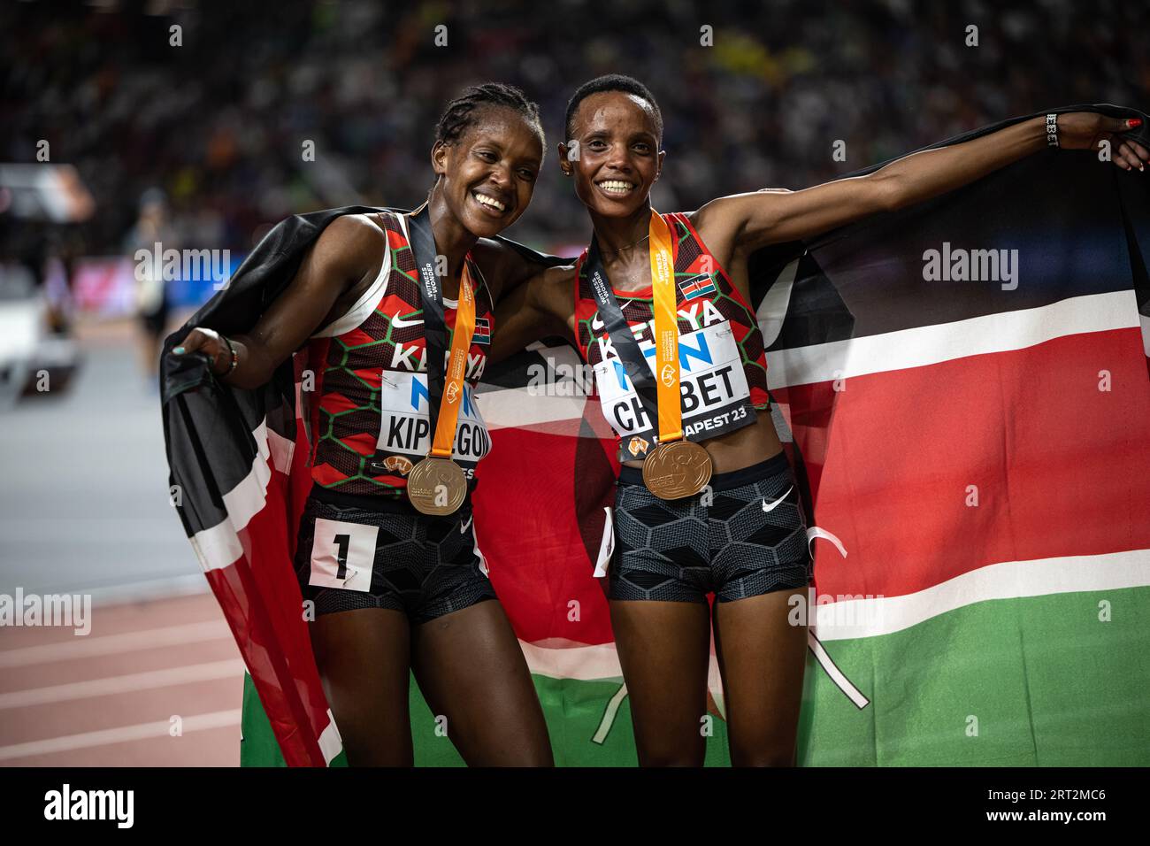 Faith Kipyegon and Beatrice Chebet celebrating hermedal with her ...