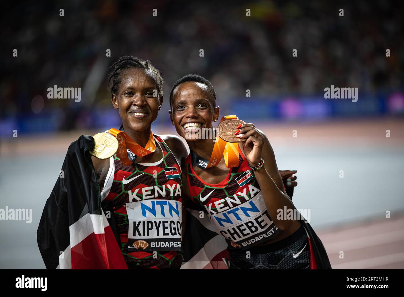Faith Kipyegon and Beatrice Chebet celebrating hermedal with her ...