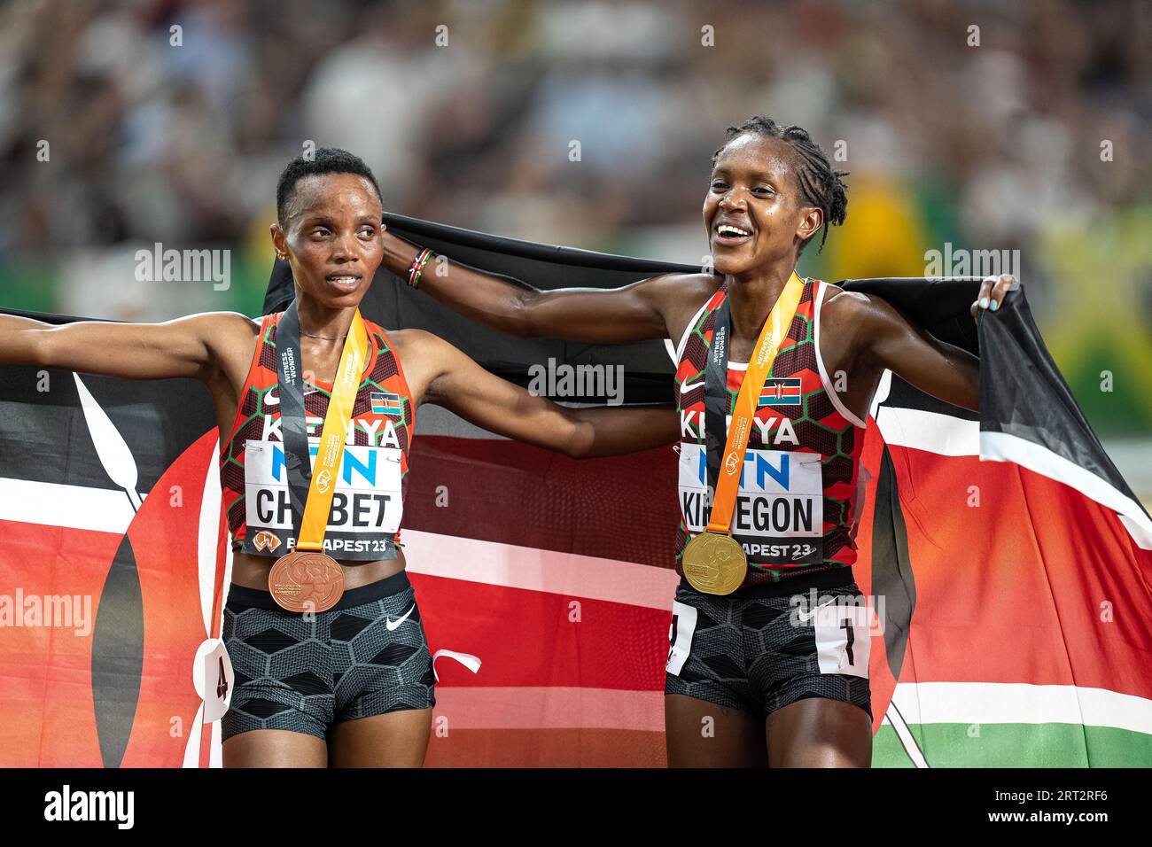 Faith Kipyegon and Beatrice Chebet celebrating hermedal with her ...