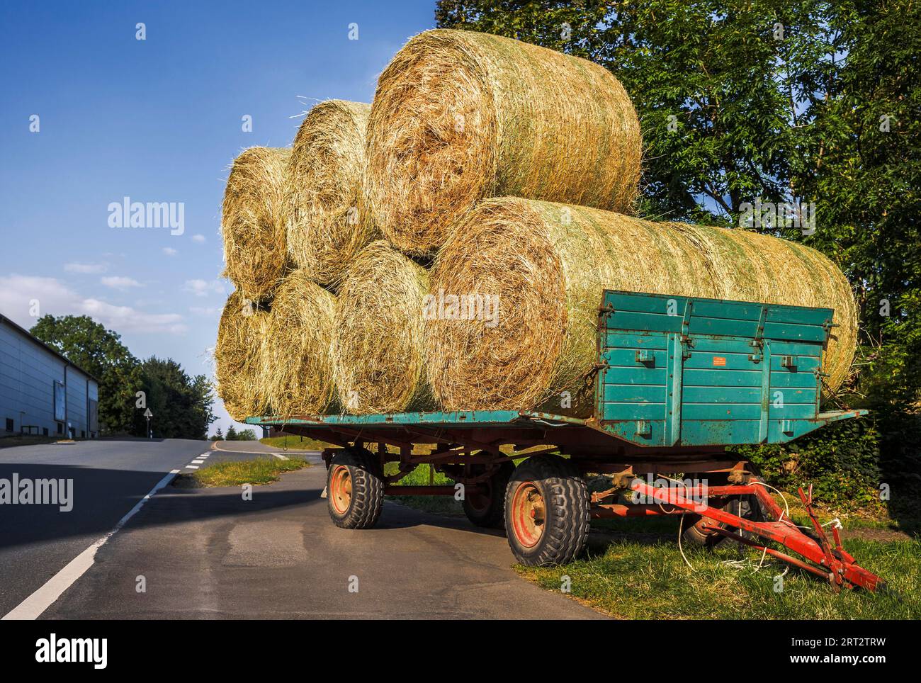 The hay cart by the road Stock Photo - Alamy