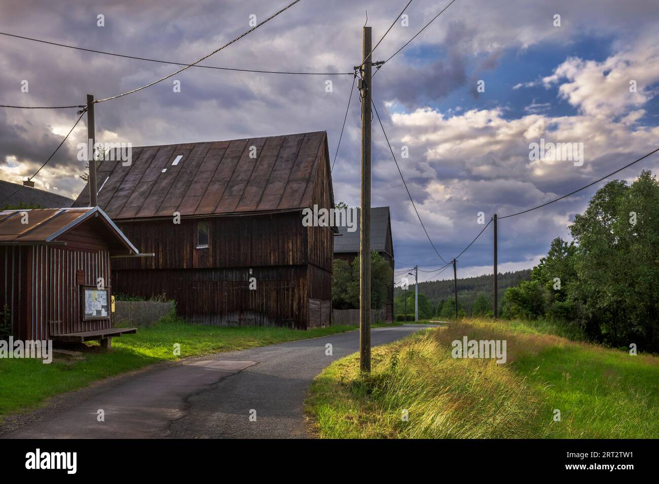 Village road with power lines Stock Photo - Alamy