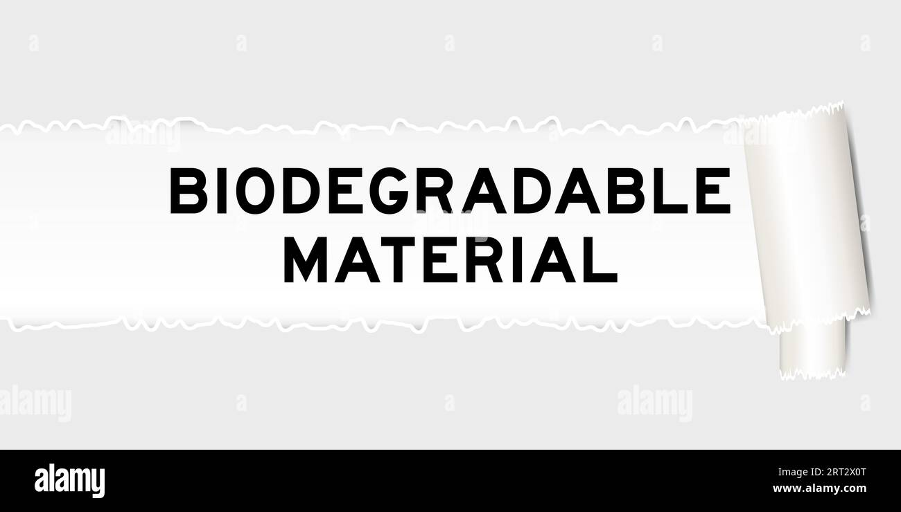 Ripped gray paper background that have word biodegradable material ...
