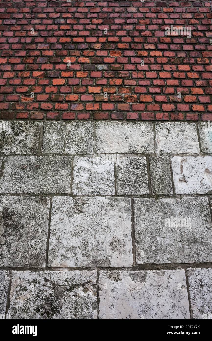 Old wall background with large stone blocks and bricks of Wawel Castle ...