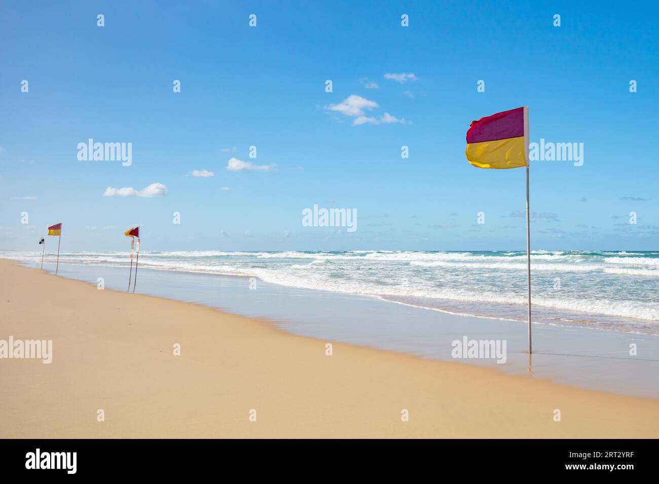Surf lifesaving flags on a hot sunny day in Broadbeach, Gold Coast ...