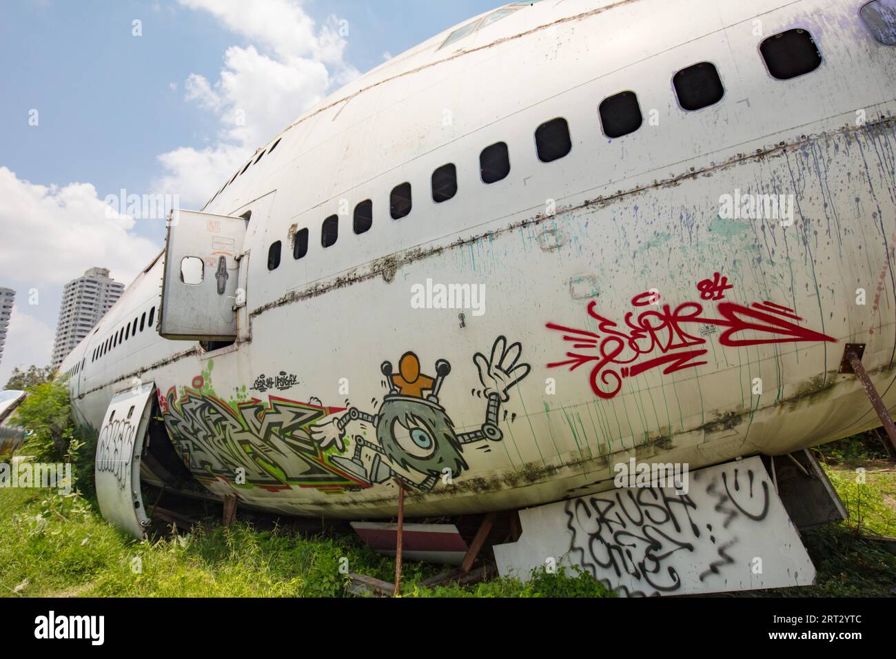 Remains of a wrecked and graffitied Boeing 747 and two McDonnell ...