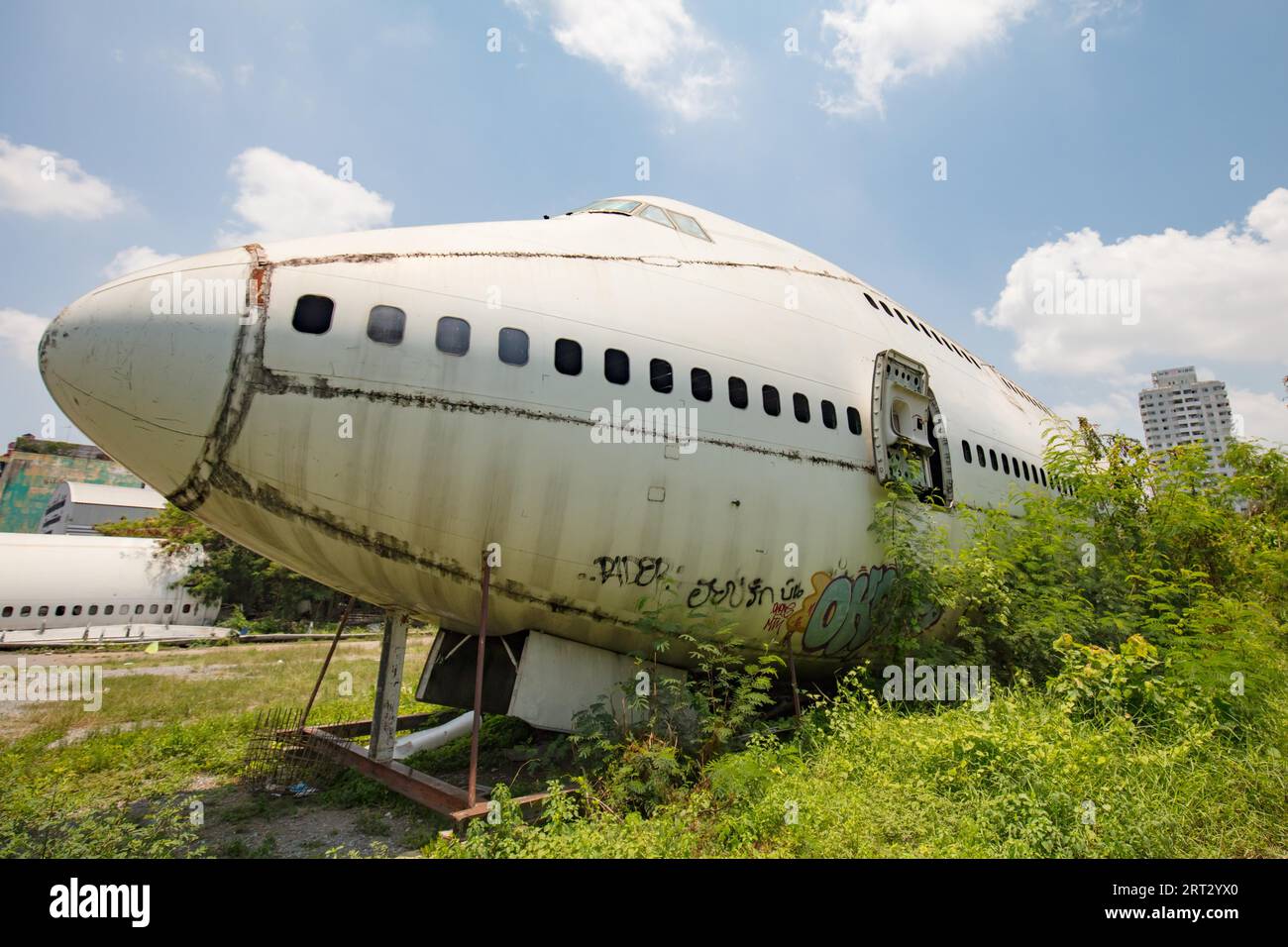 Remains of a wrecked and graffitied Boeing 747 and two McDonnell ...