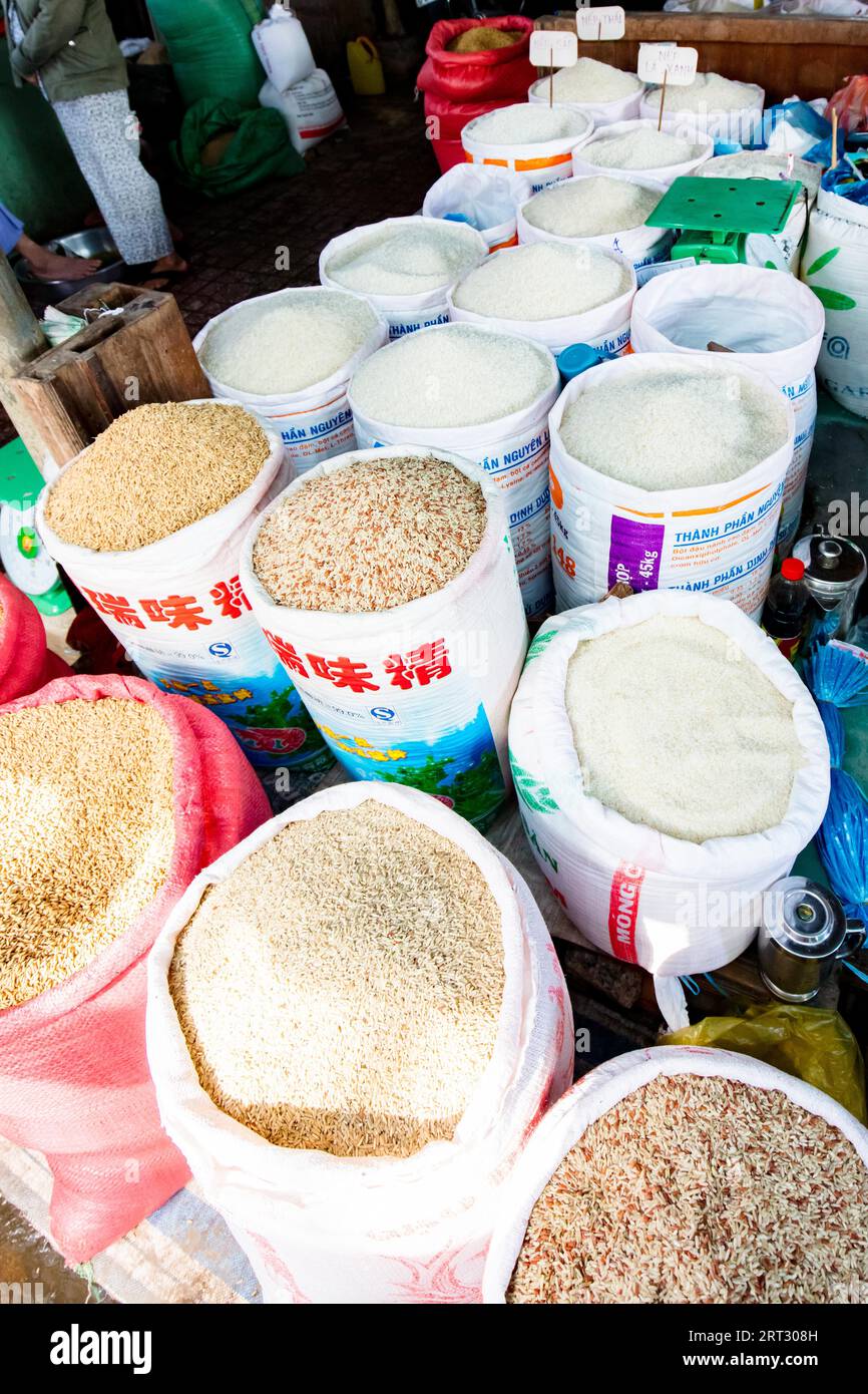 A local market stall selling rice in Cai Be in the Mekong Delta in ...