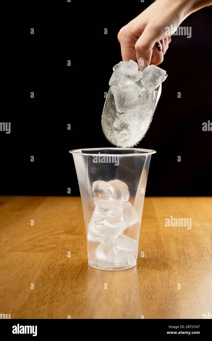 Adding ice water mix close hi-res stock photography and images - Alamy