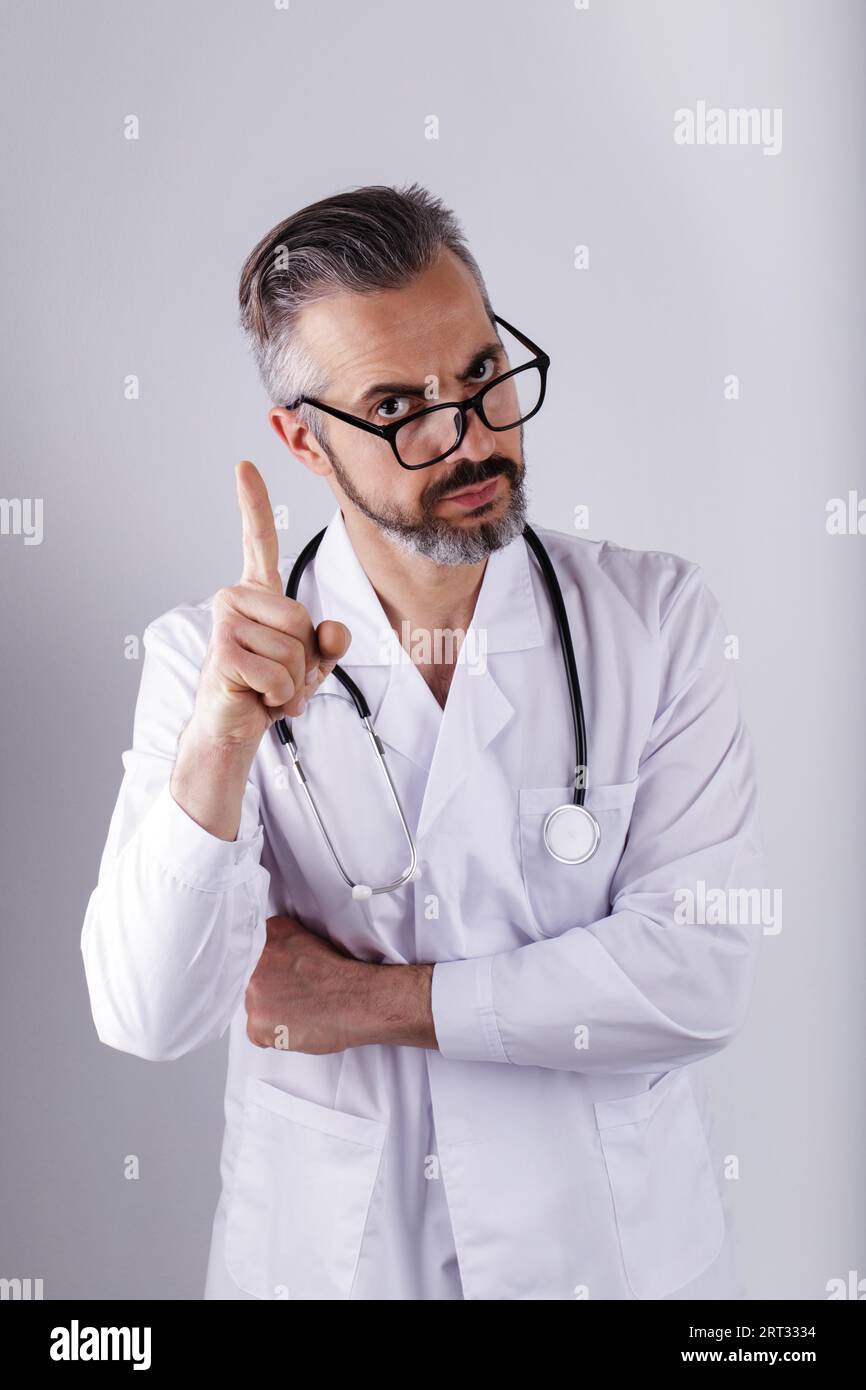 Middle aged doctor wearing glasses hi-res stock photography and images ...