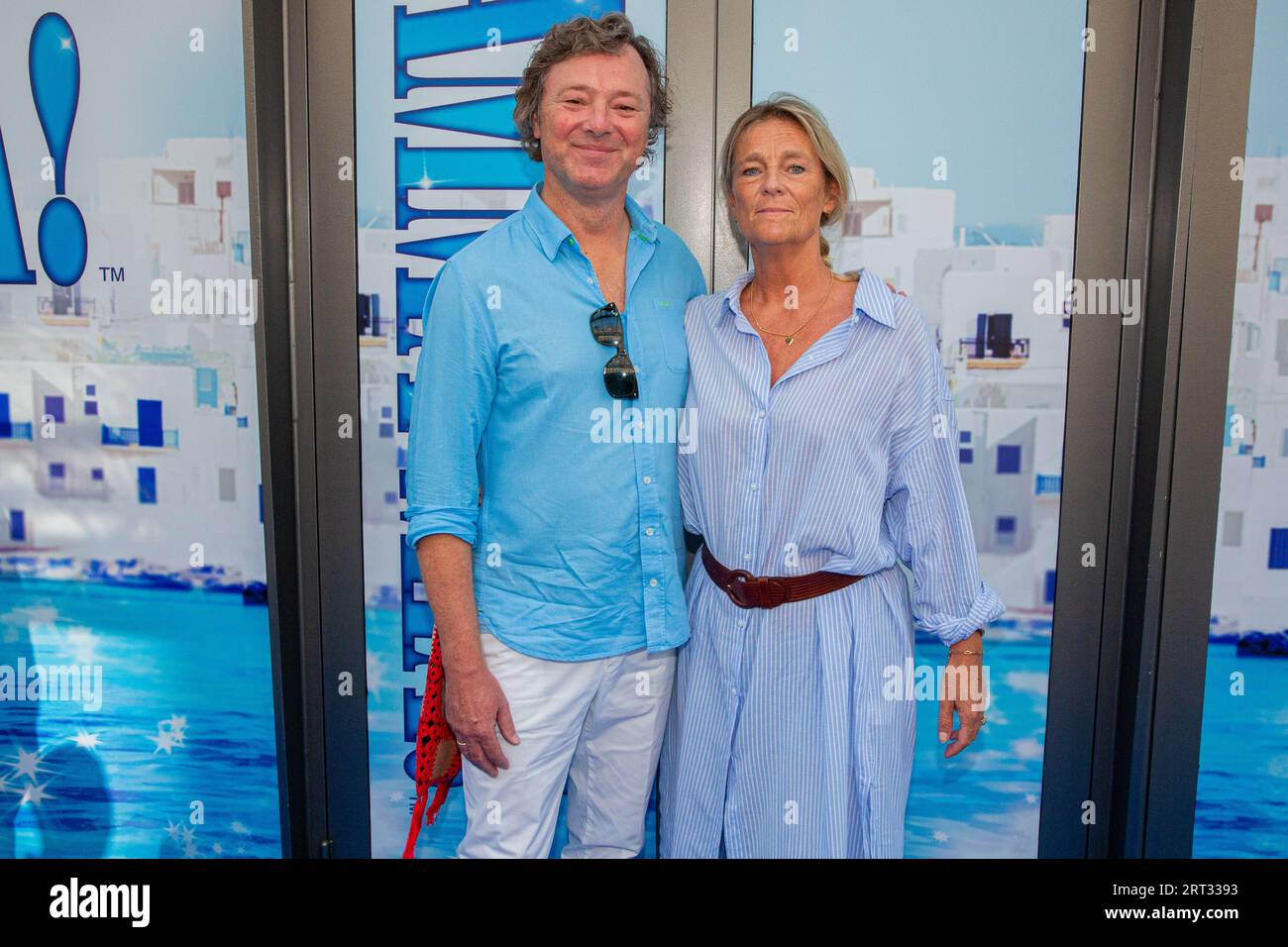 AMSTERDAM - Frits Sissing with his partner on the blue carpet during ...