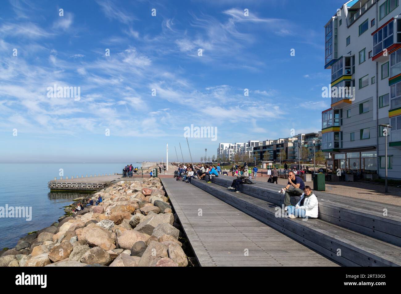 Malmo, Sweden, April 20, 2019: People on a boardwalk along the ...