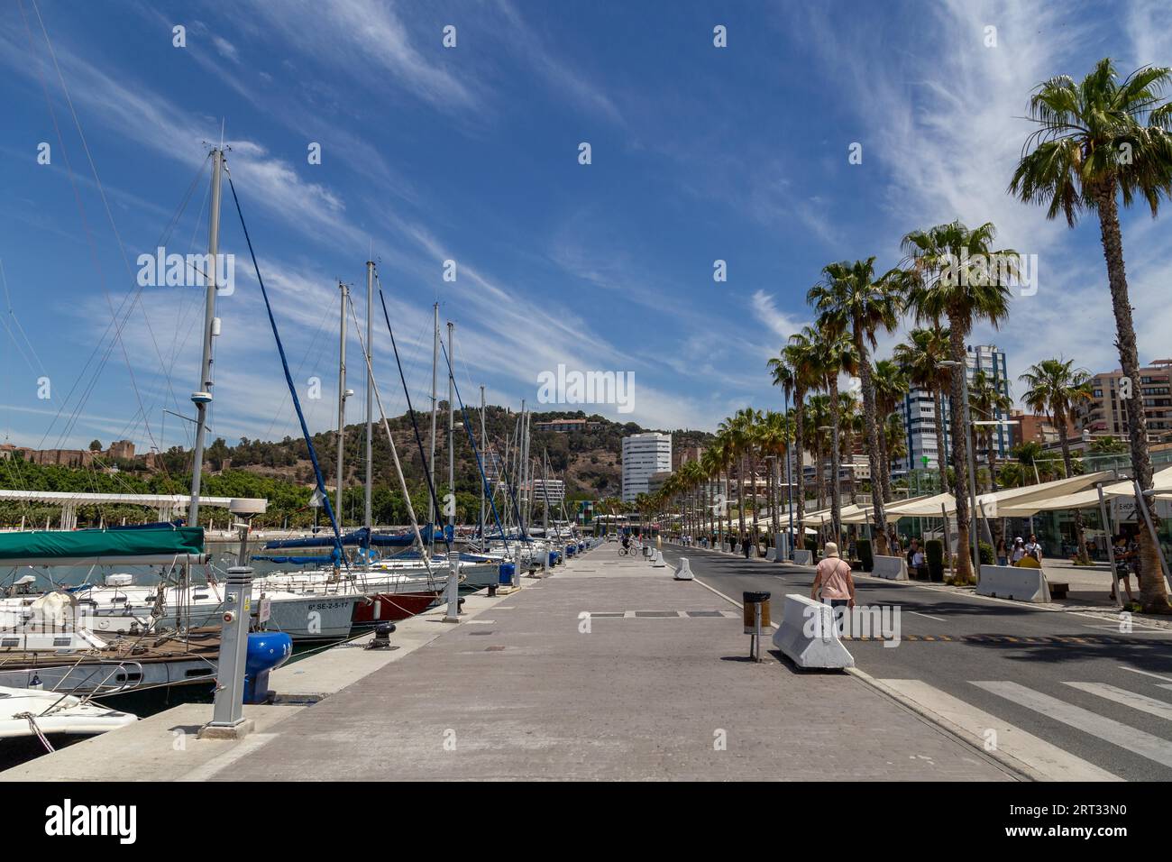 Malaga, Spain, May 24, 2019: Yachts and people at the Paseo del Muelle ...