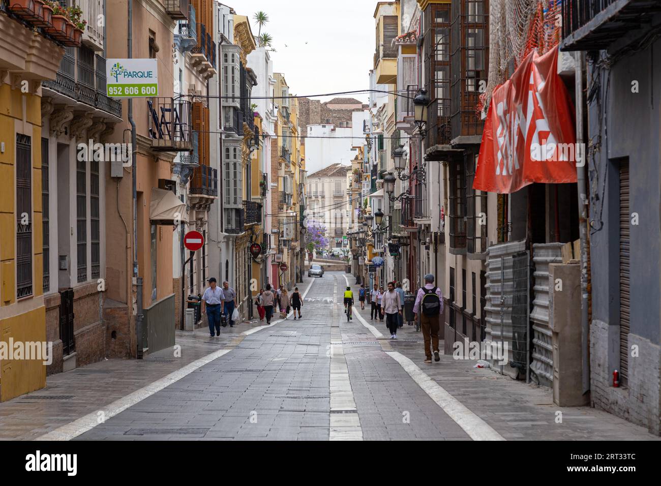 Malaga, Spain, May 24, 2019: People in the charming streets in the ...