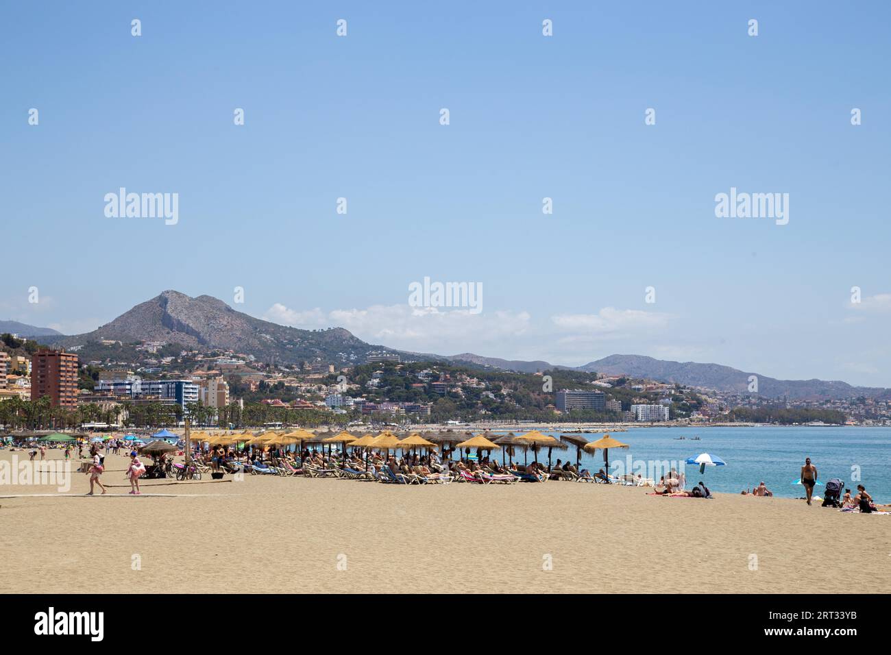 Malaga, Spain, May 25, 2019: People enjoying the sun at the beach La ...