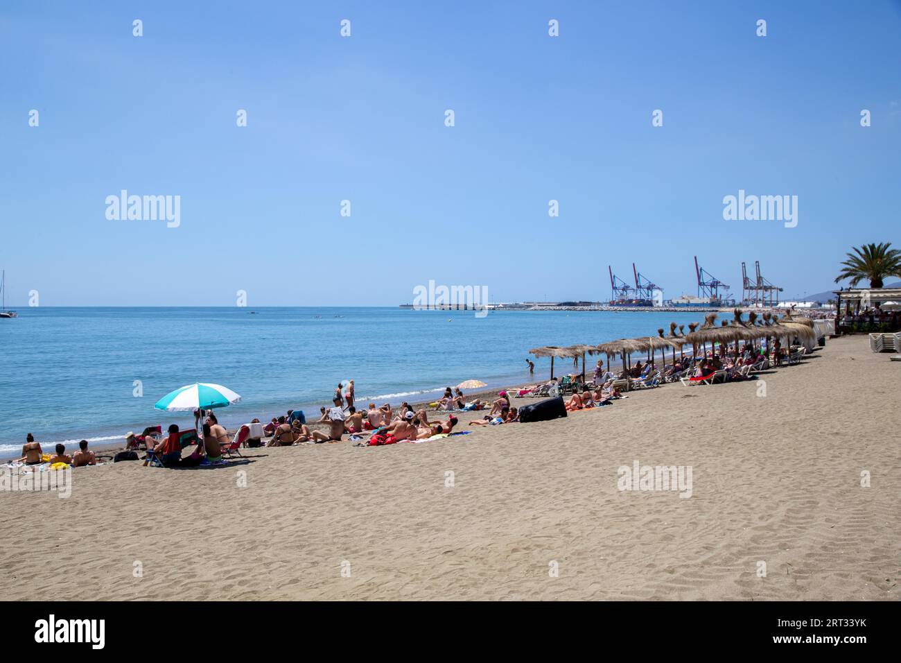 Malaga, Spain, May 25, 2019: People enjoying the sun at the beach La ...