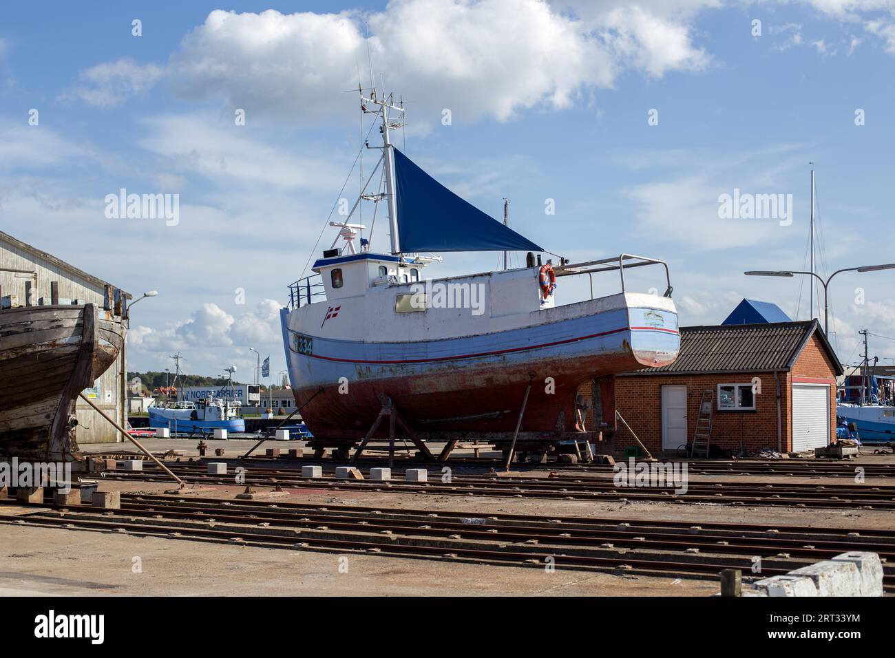 Hundested, Denmark, May 03, 2018: A boat in the dry dock in the small ...