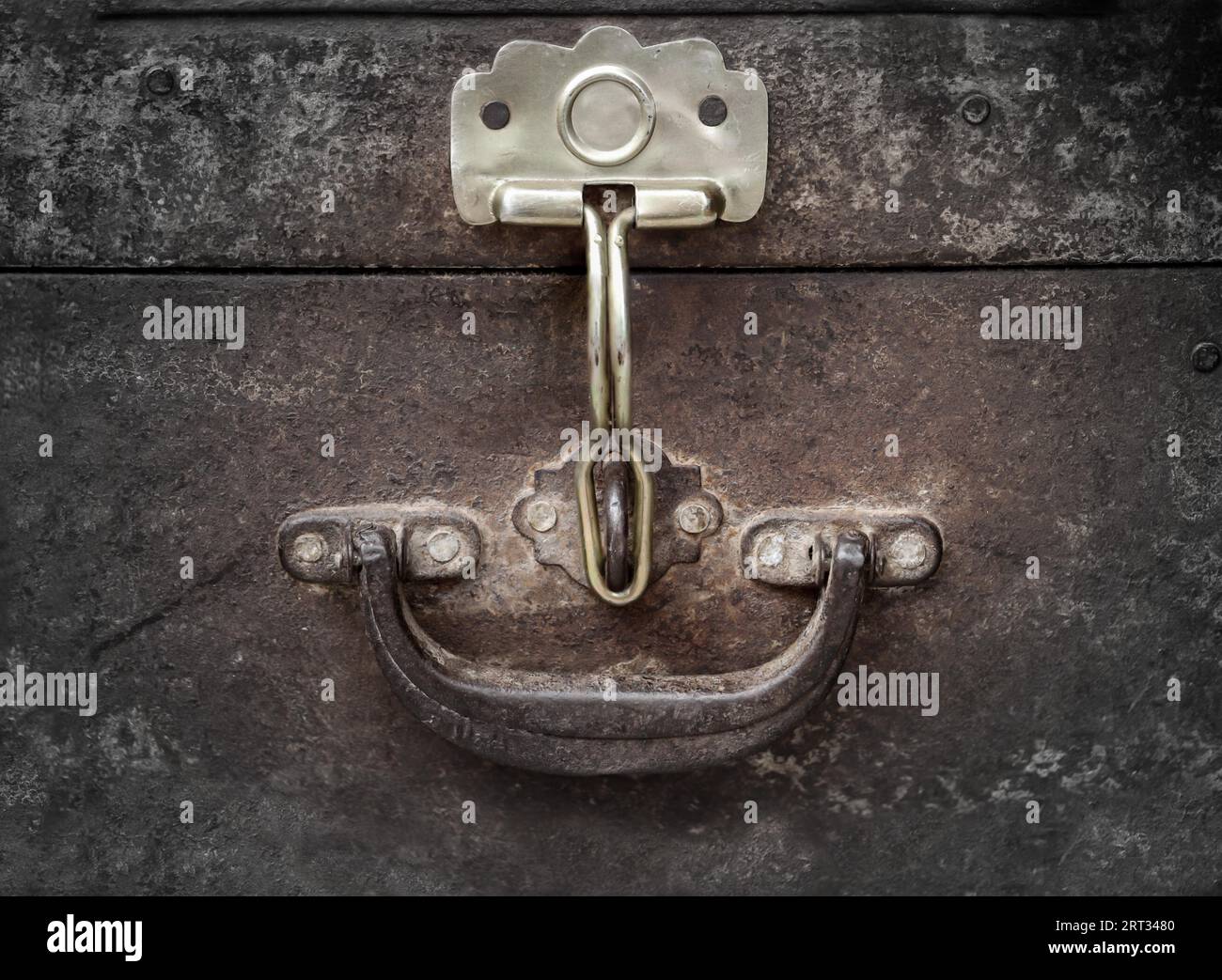 The metal lockable closure of a suitcase or chest Stock Photo - Alamy