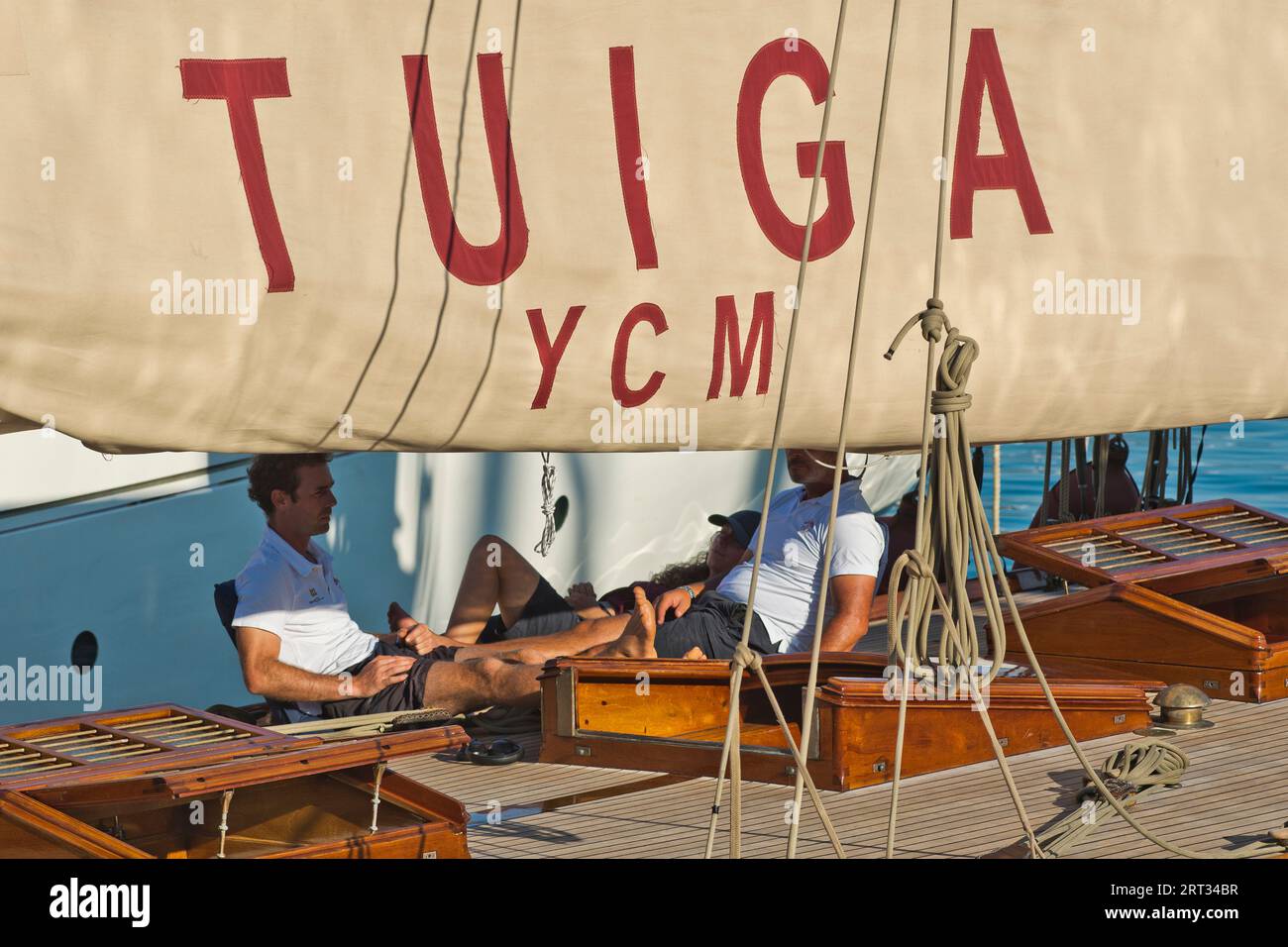 Crew members relaxing on deck of Tuiga classic yacht - Vele d'Epoca di ...