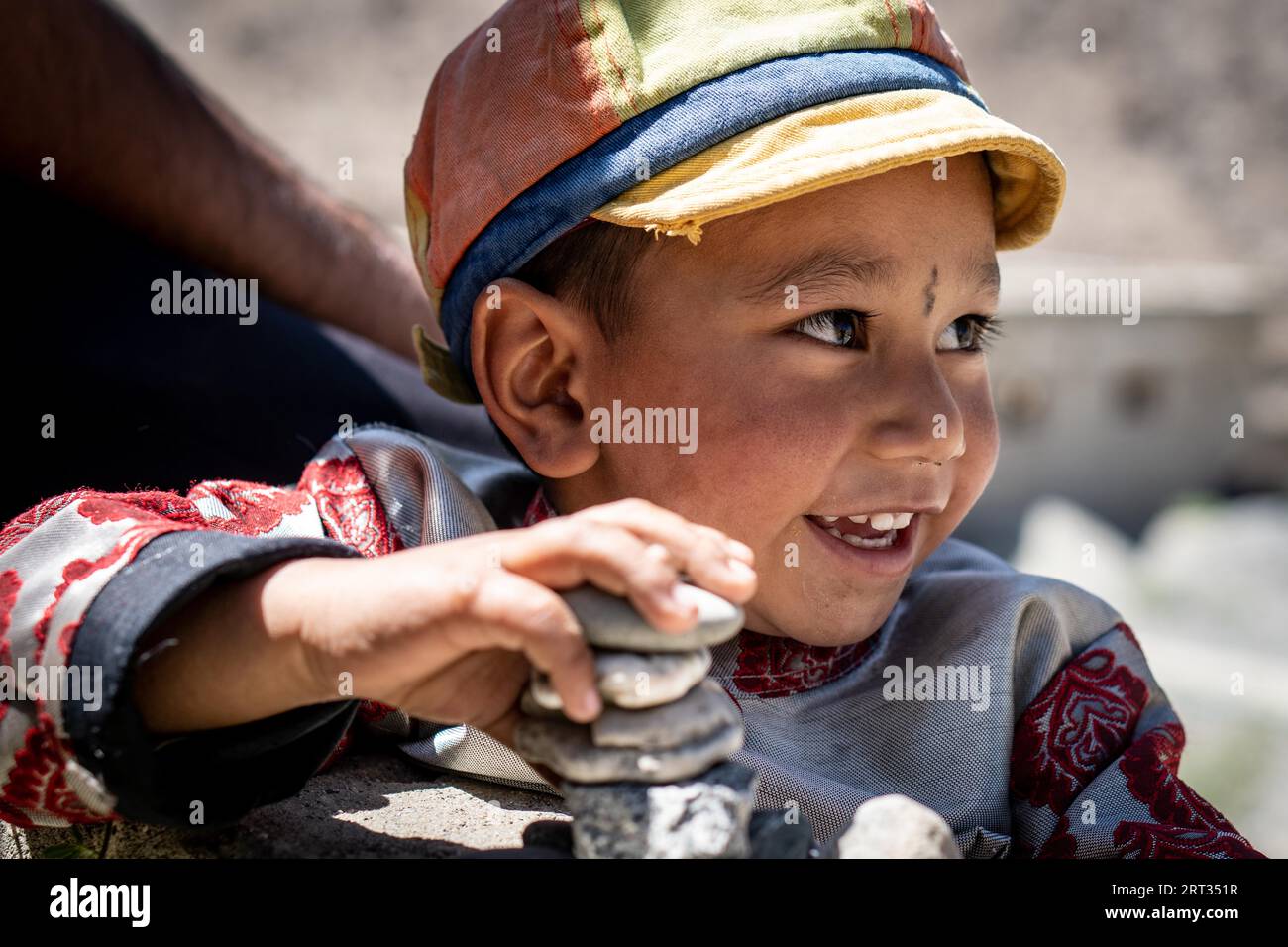 Ladakh, India, August 29, 2018: Portrait of a cute smiling indigenous ...