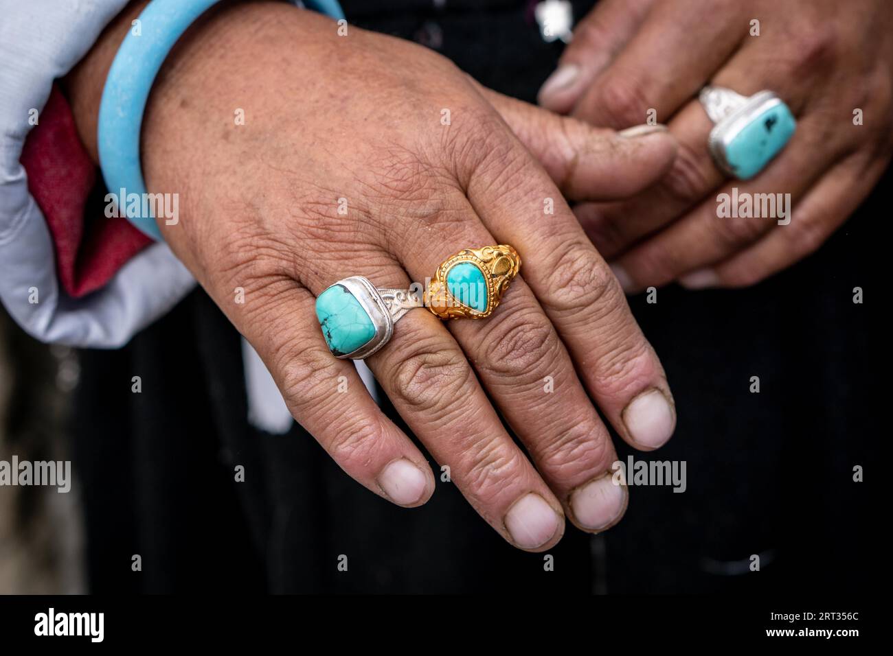 Detail on hands of elderly ethnic Indian woman with large rings on her ...