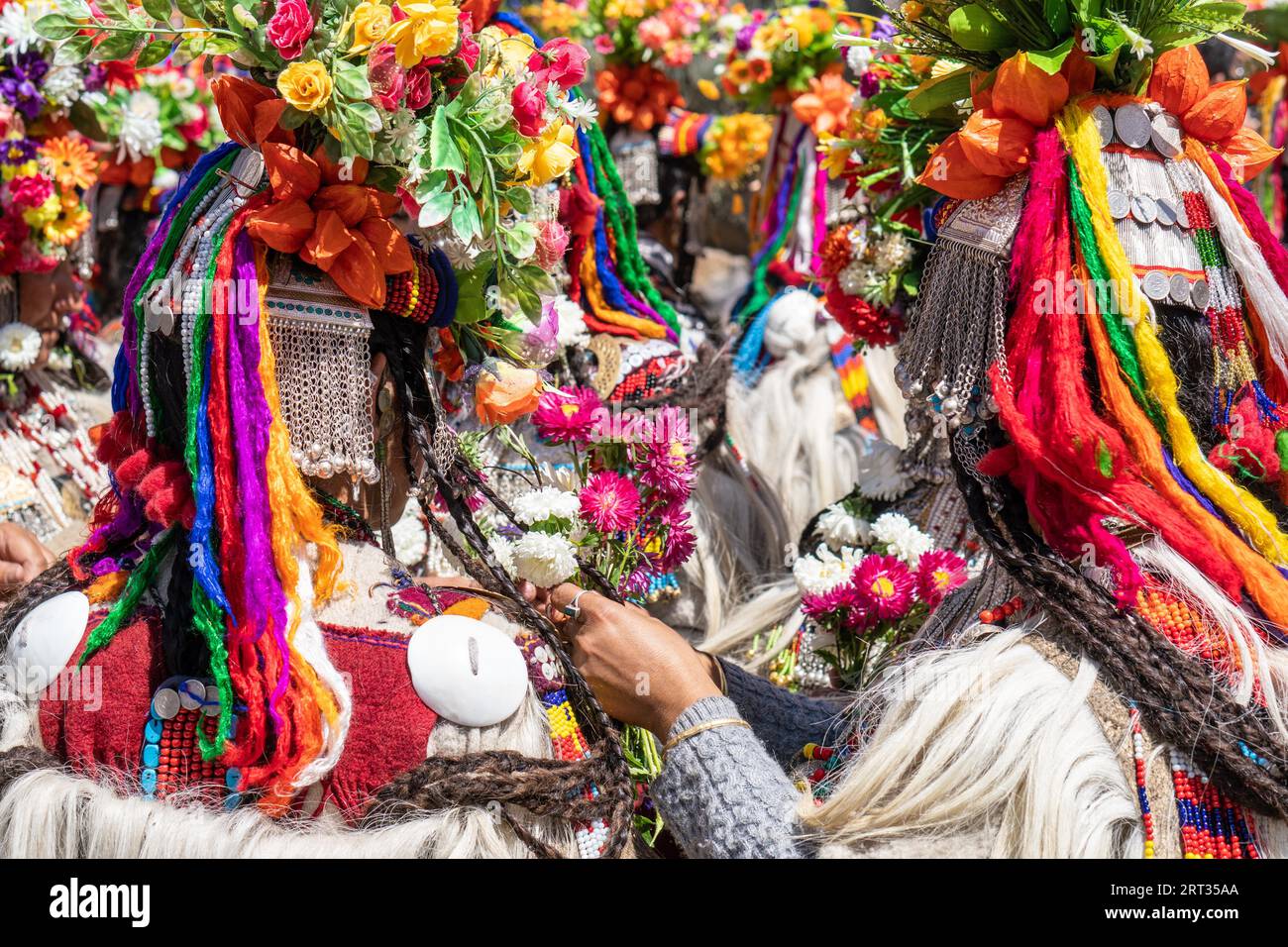 Ladakh, India, August 29, 2018: Colorful traditional hats of performers ...