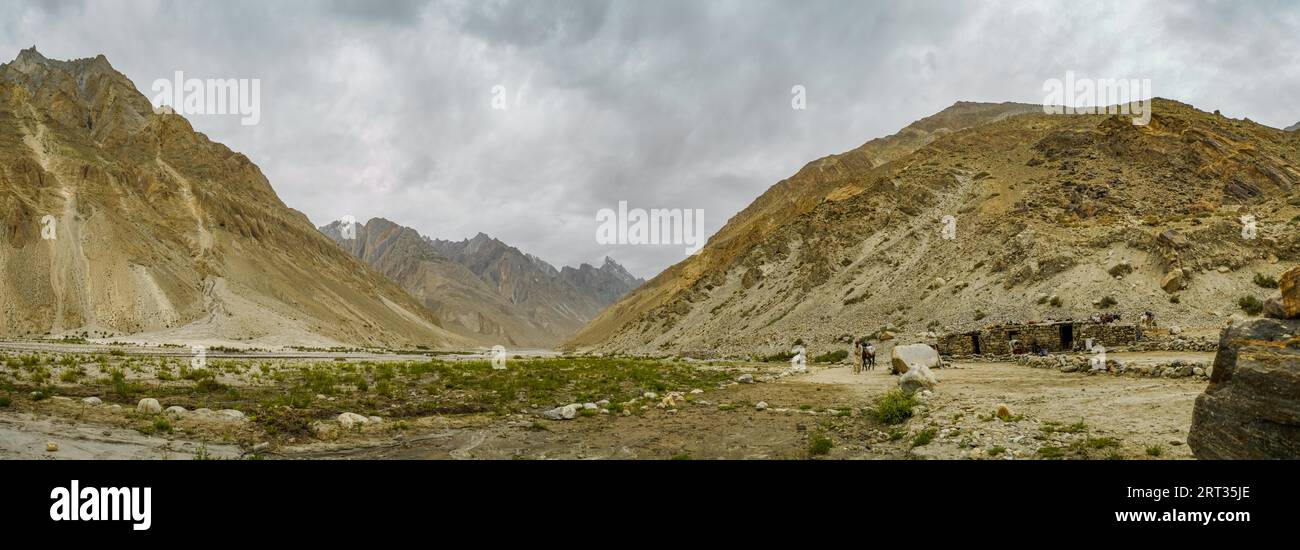 Panoramic view of remote old settlement in Karakoram Mountain Range in ...