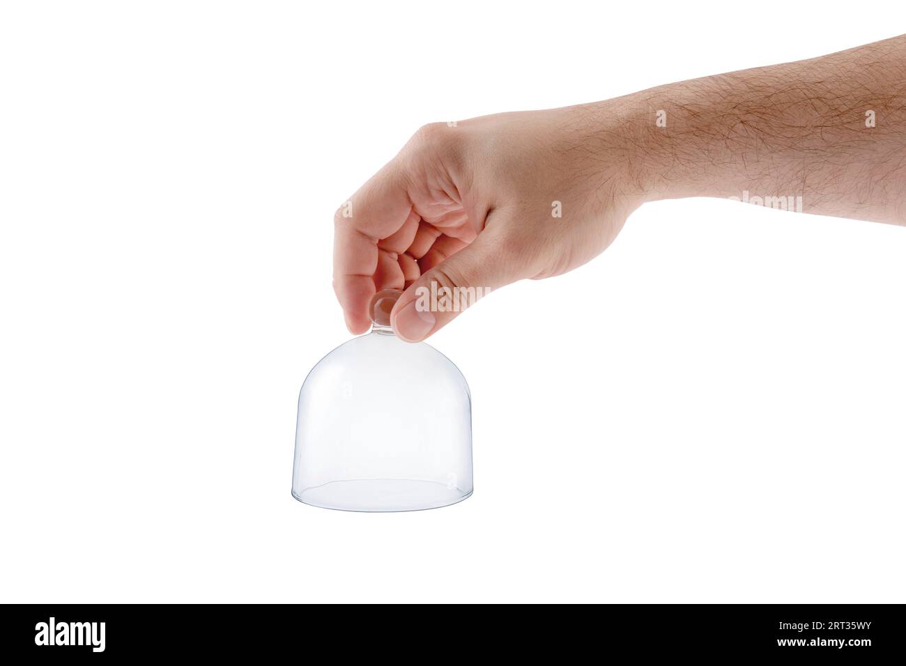 Hand holding a glass bell isolated on white background with clipping ...