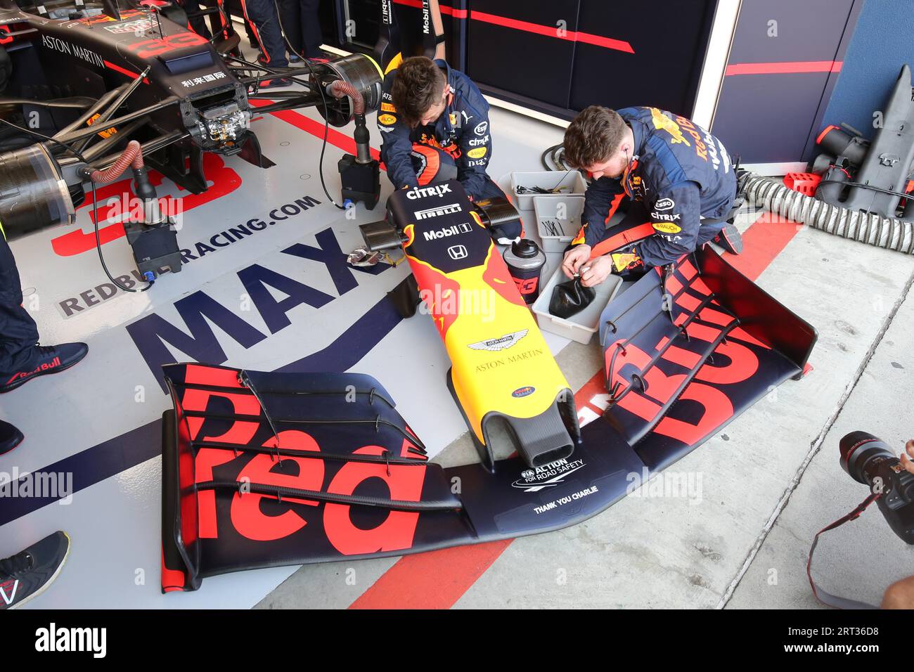 MELBOURNE, AUSTRALIA, MARCH 17: Aston Martin Red Bull Racing mechanics ...