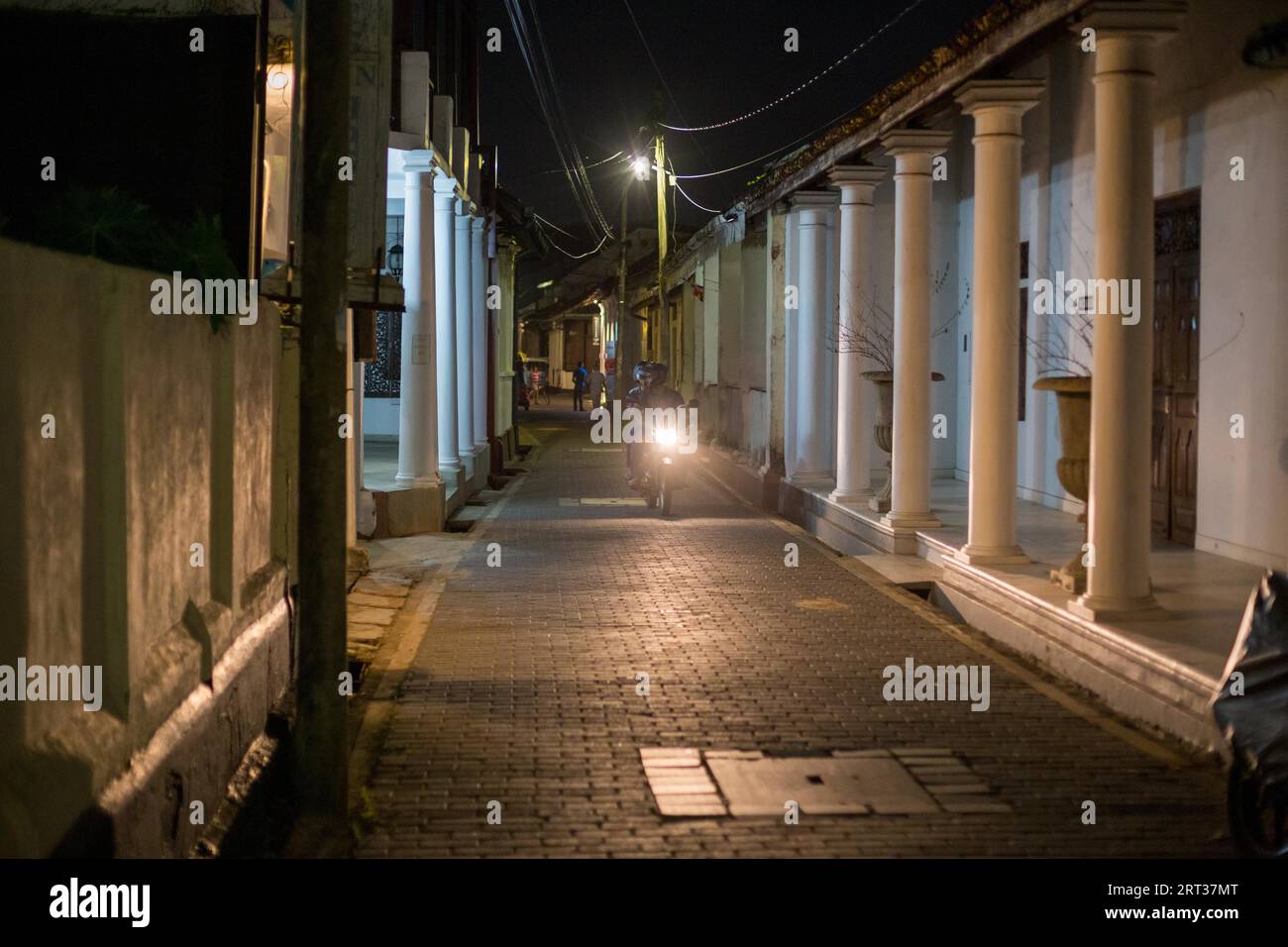 Galle Fort, Sri Lanka, July 28, 2018: Night view of a small cozy street ...