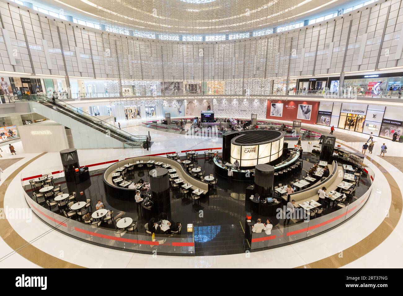 Dubai, UAE, July 19, 2018: People inside an atrium inside Dubai Mall ...