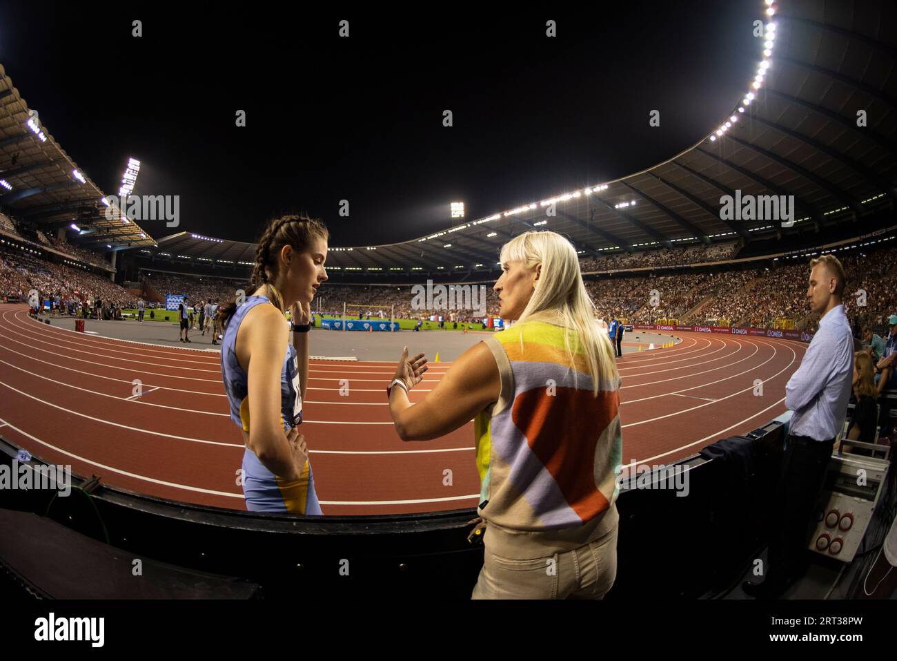 Yaroslava Mahuchikh of Ukraine talking to her coach Tatyana Stepanova ...
