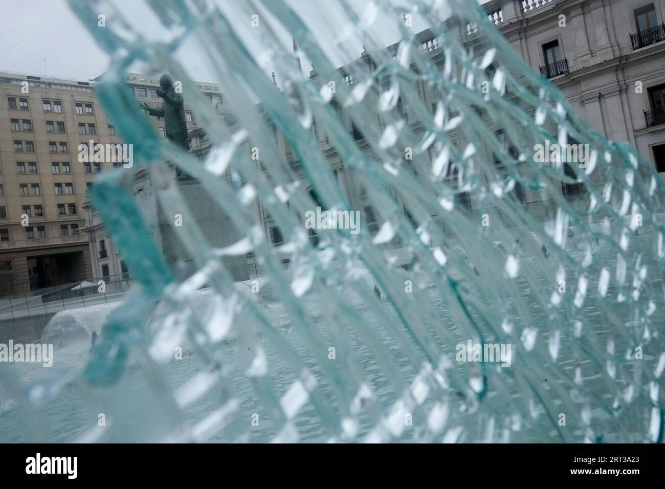 The statue of Chile's late President Patricio Aylwin is seen through ...