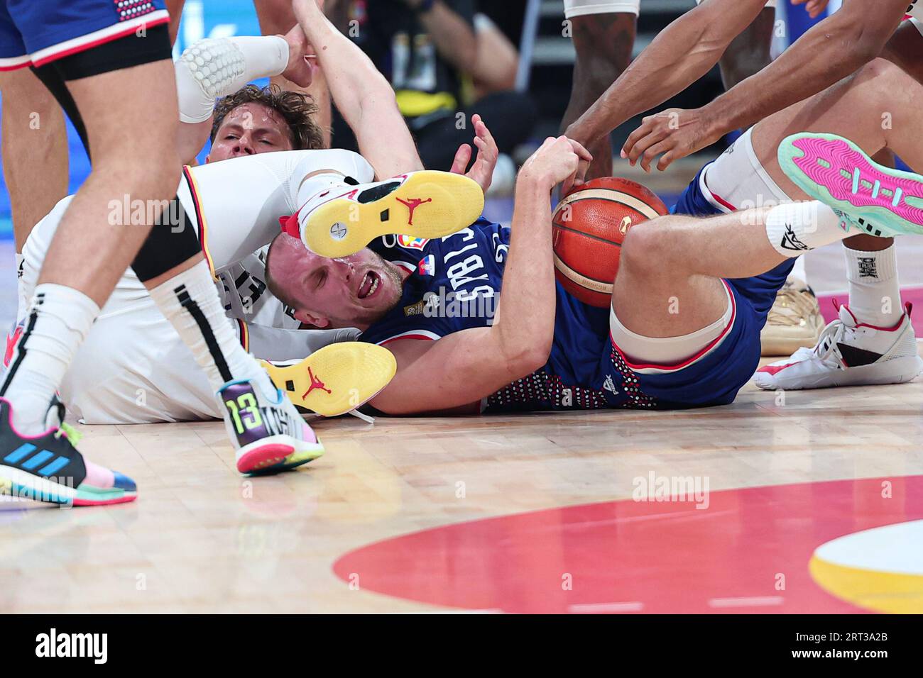 Manila, Philippines. 10th Sep, 2023. Dejan Davidovac (R) of Serbia and ...
