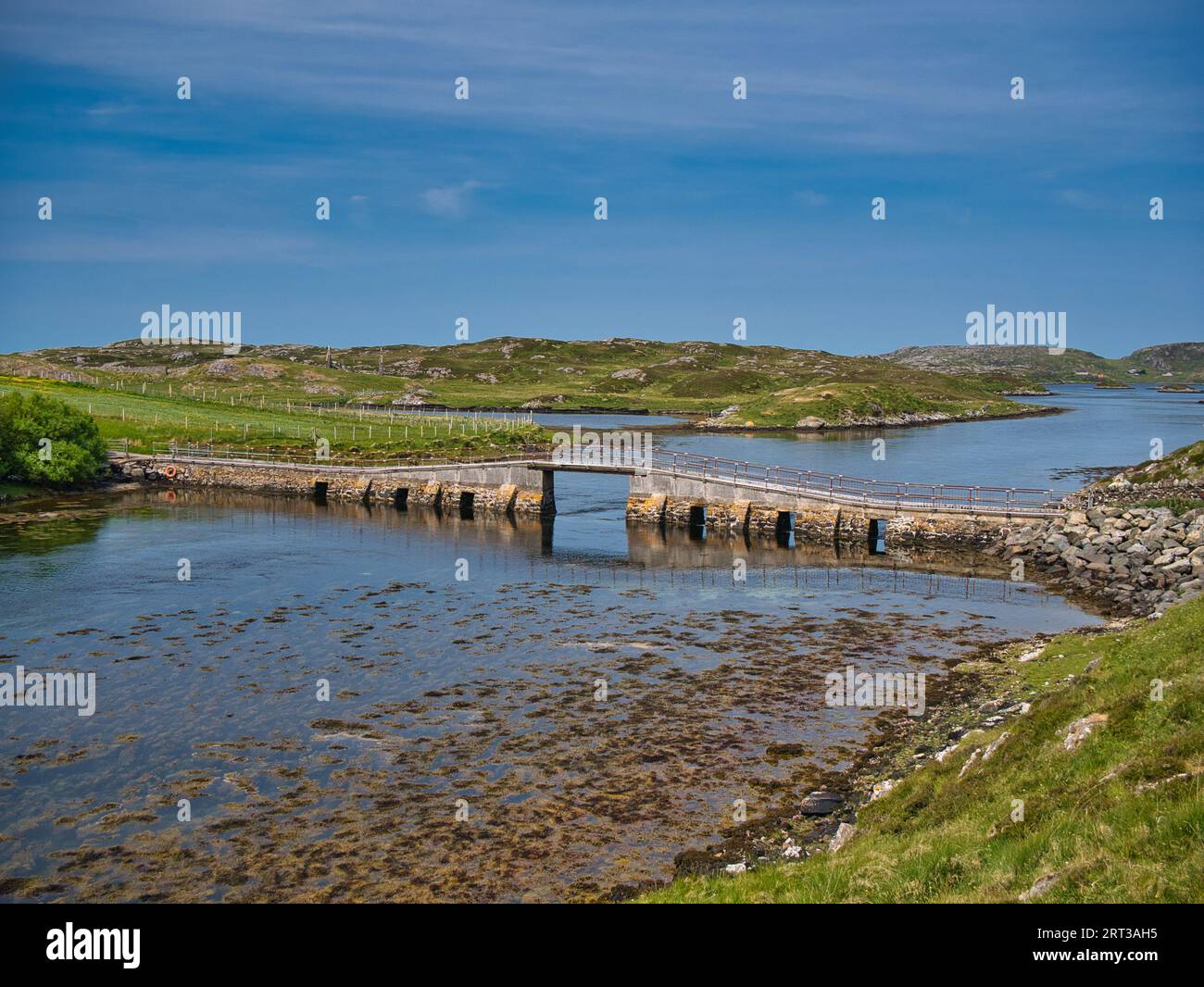 A footbridge across the Tob Bhalasaigh sea inlet near Bhalasaigh ...