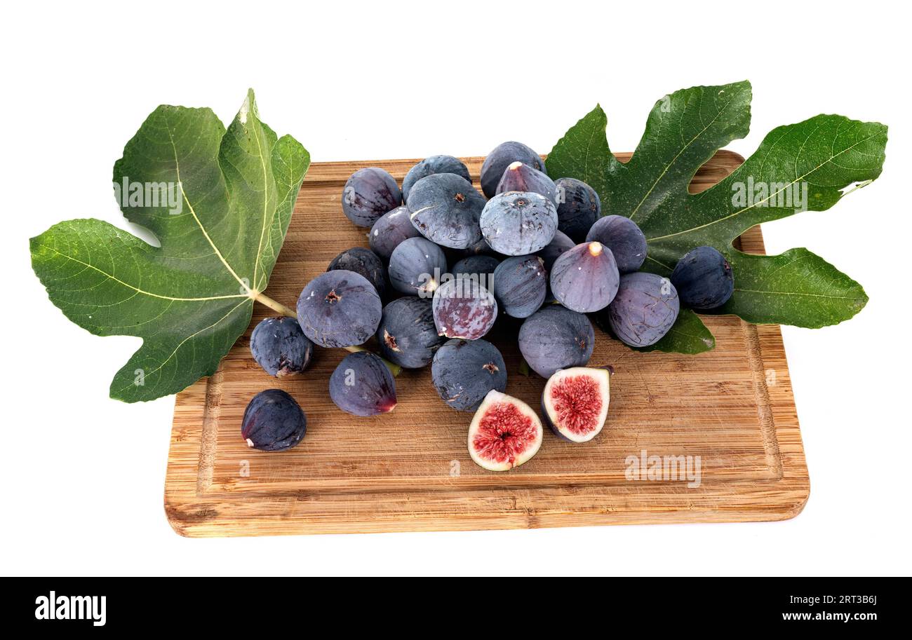 purple figs in front of white background Stock Photo - Alamy