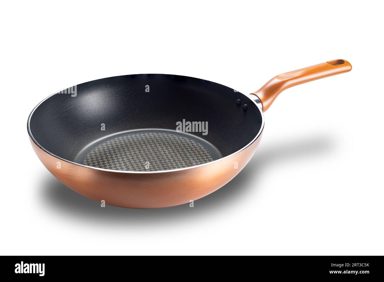 High angle view of stainless steel frying pan with wooden handle ...