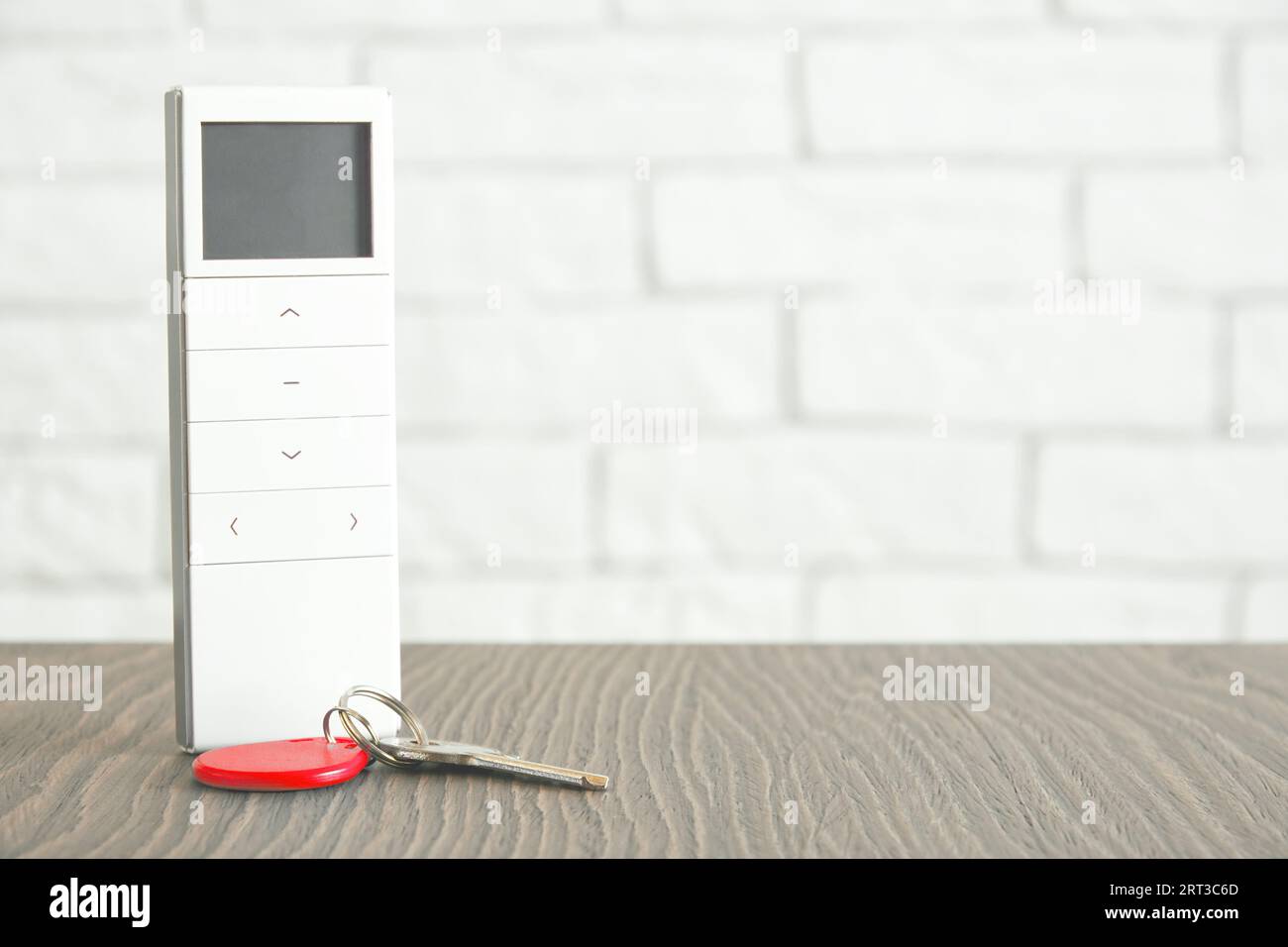 House remote controller with display and metallic keys from the door ...