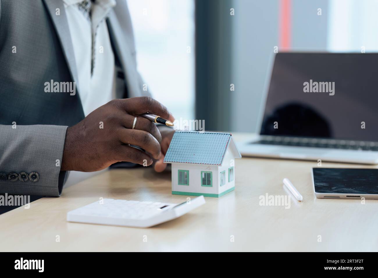 Real Estate Agent and client talking about Property insurance and ...