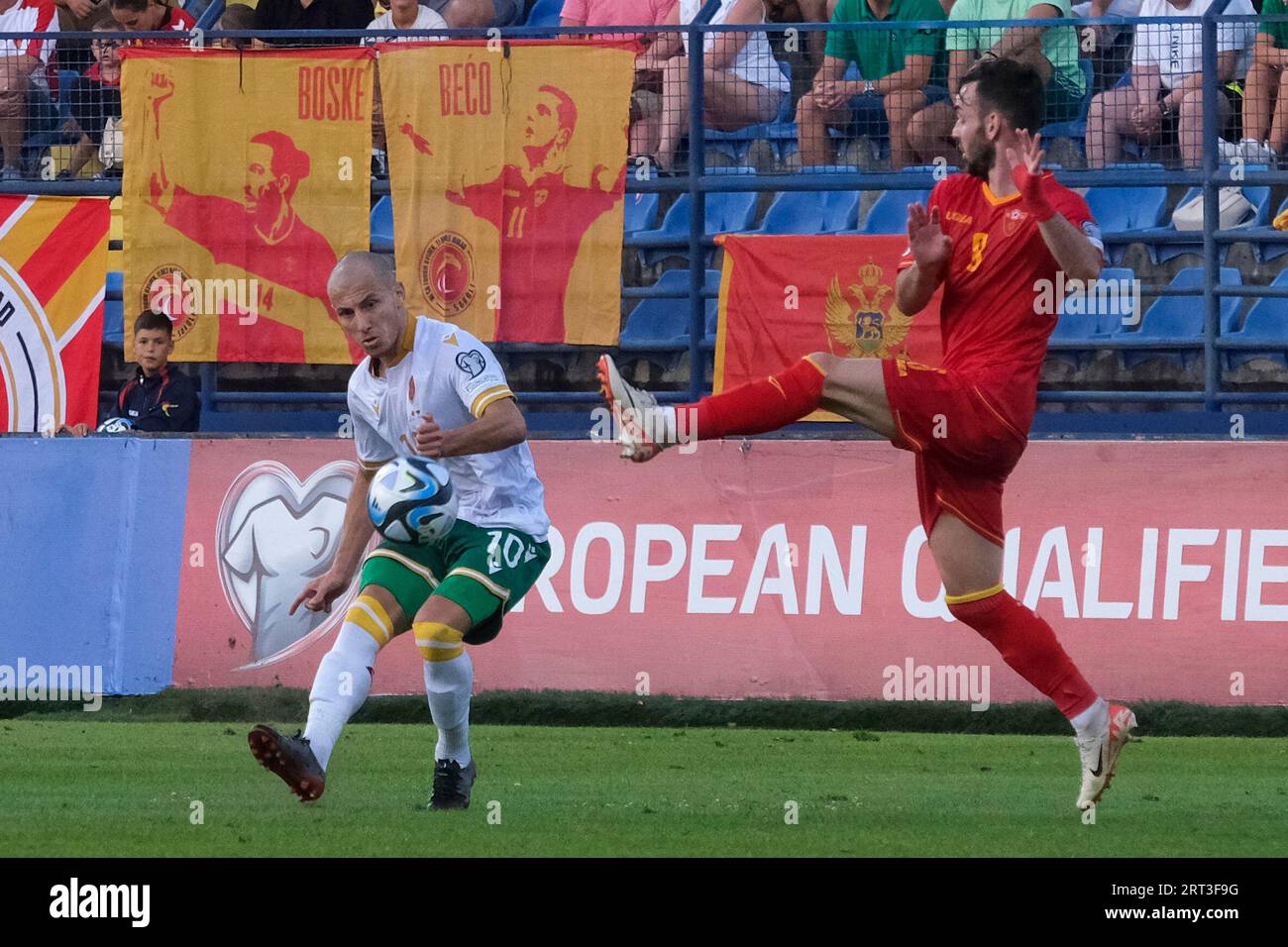 Bulgaria's Georgi Rusev, left, is challenged by Montenegro's Marko ...